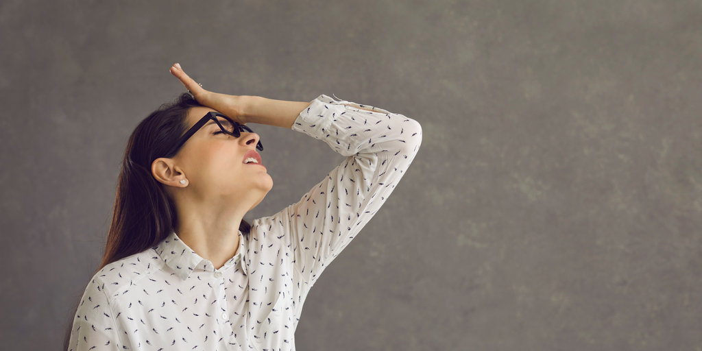 Young caucasian woman touching forehead regrets wrong doing studio shot – Watts Up With That?